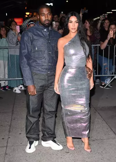 O Kim Kardashian e ufiufi Kanye i le lotolotoi o le tatalaina o faaipoipoga Drama