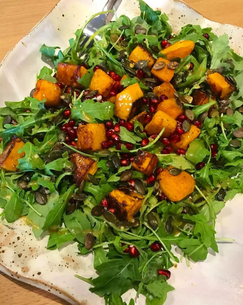 Chrissy-Teigen-Roasted-butternut-squash-over-arugula-with-a-garlicy-madu-dijon-dressing-nov-2016