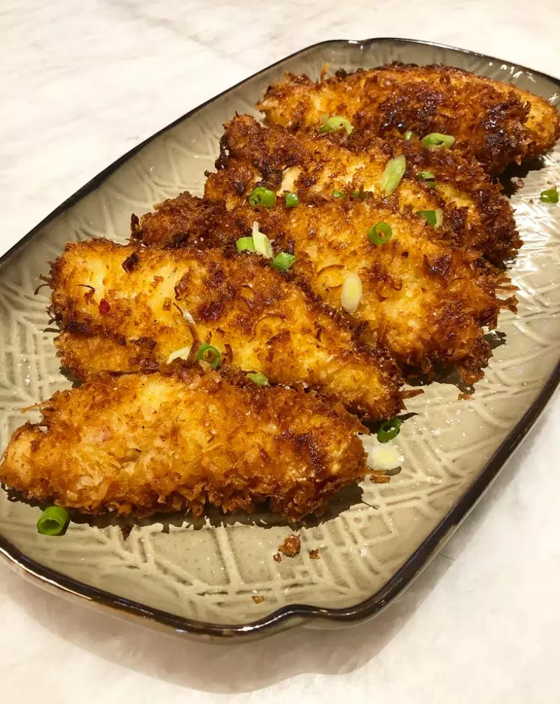 Chrissy-Teigen-crispy-coconut-chicken-tenders-with-sriracha-amis-cabe-dec-2018